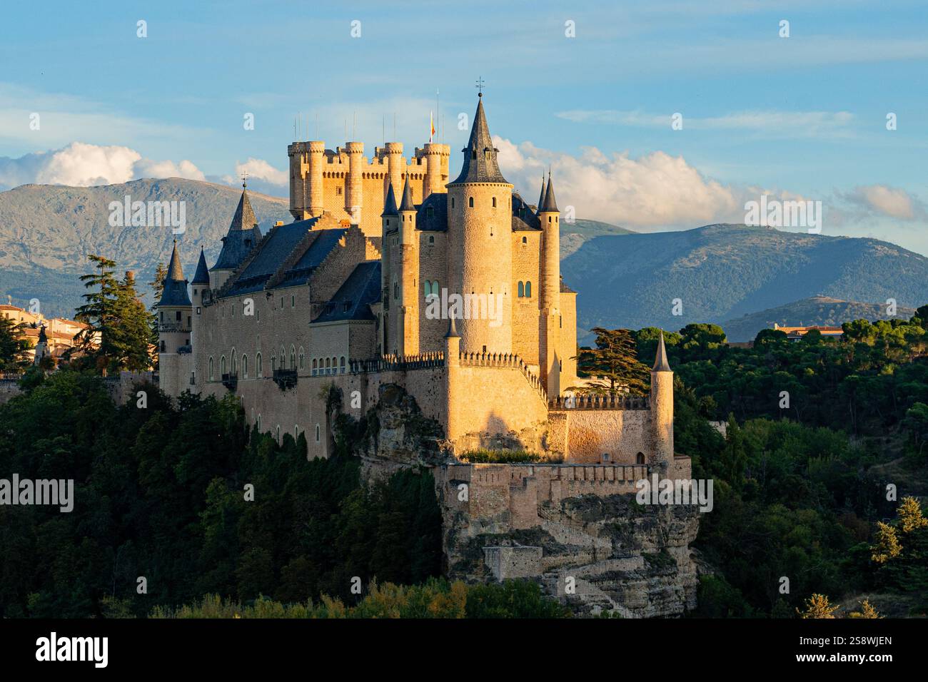 Alcázar of Segovia, a medieval castle built on a rocky crag in Castile ...