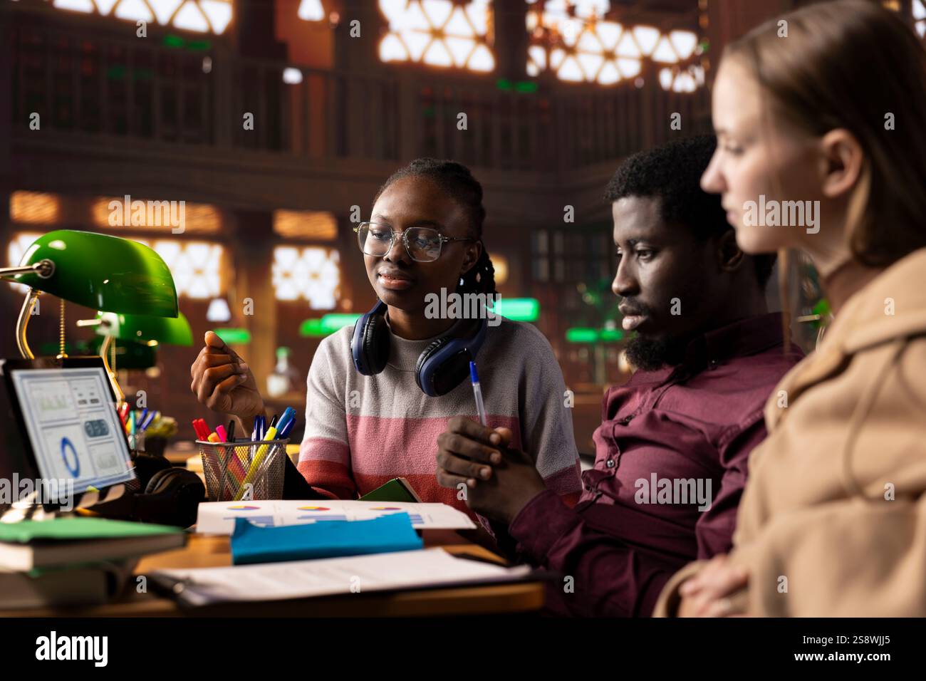 College students collaborating on a startup project in the campus ...