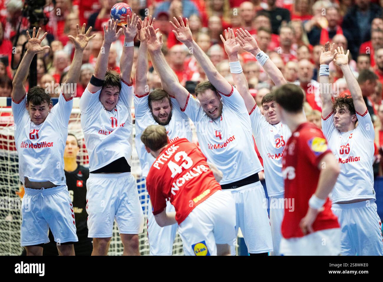 Denmark's Simon Bogetoft Pytlick (43) throws at goal in the last second ...