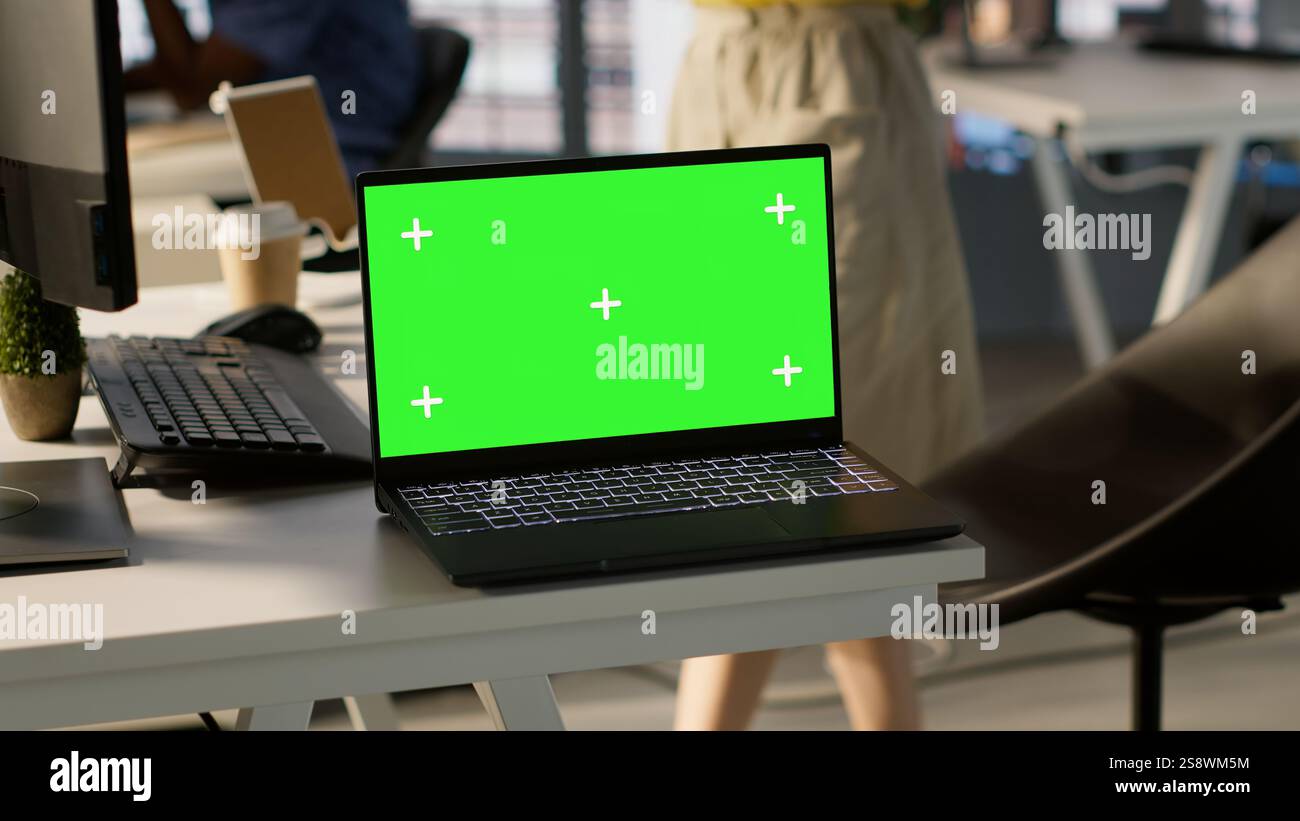 Focus On Chroma Key Laptop In Workspace Used By Computer Scientists Doing Software Debugging