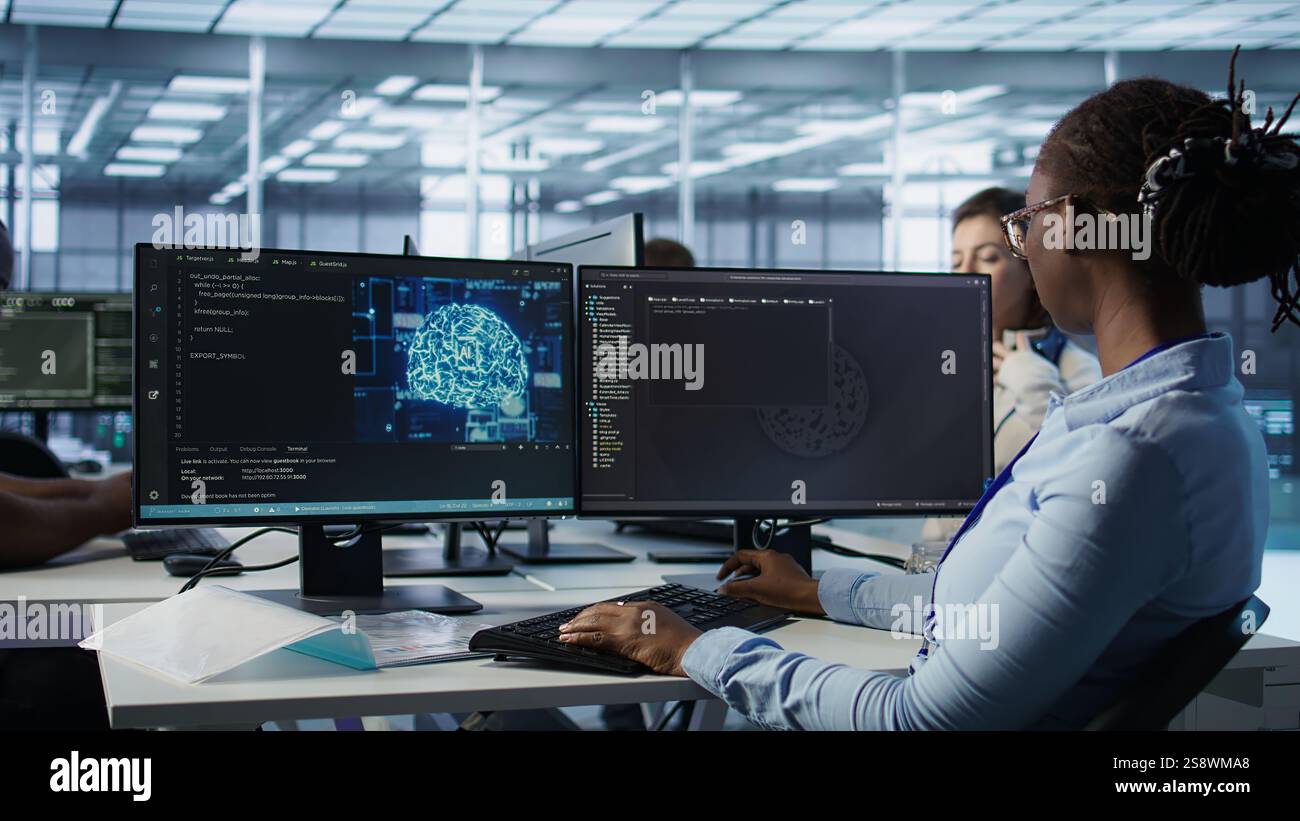 Woman leaving desk after finishing programming tasks in AI data center used for machine learning ...