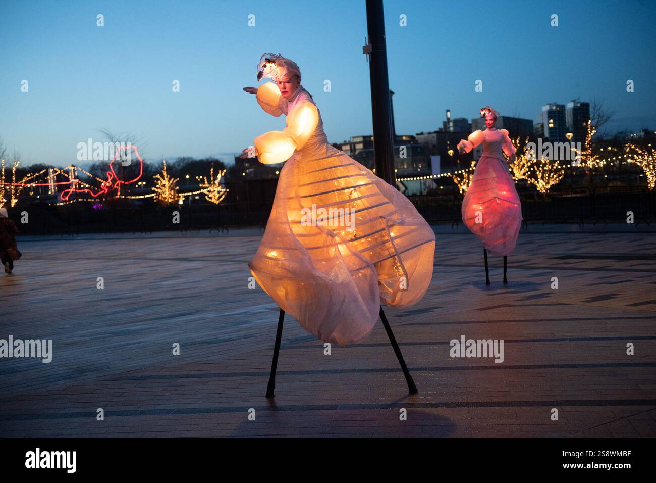 London, UK. 23 Jan 2025. Pictured: A general view of LED Stilt walkers ...