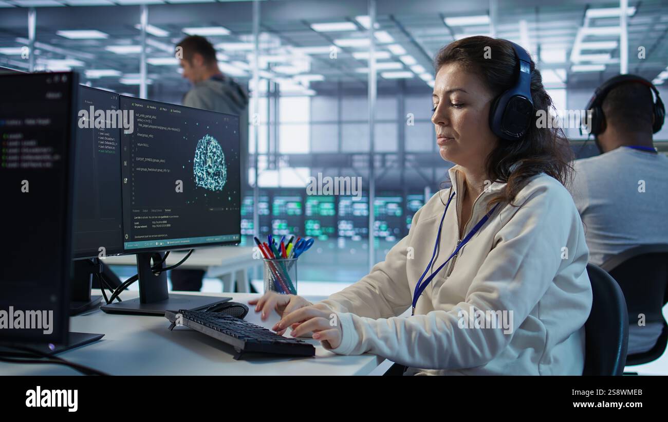 Developer listening music while programming in AI data center used for machine learning training ...