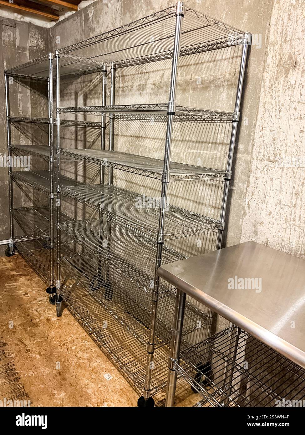 Metal Storage Shelves in Residential Basement Stock Photo - Alamy