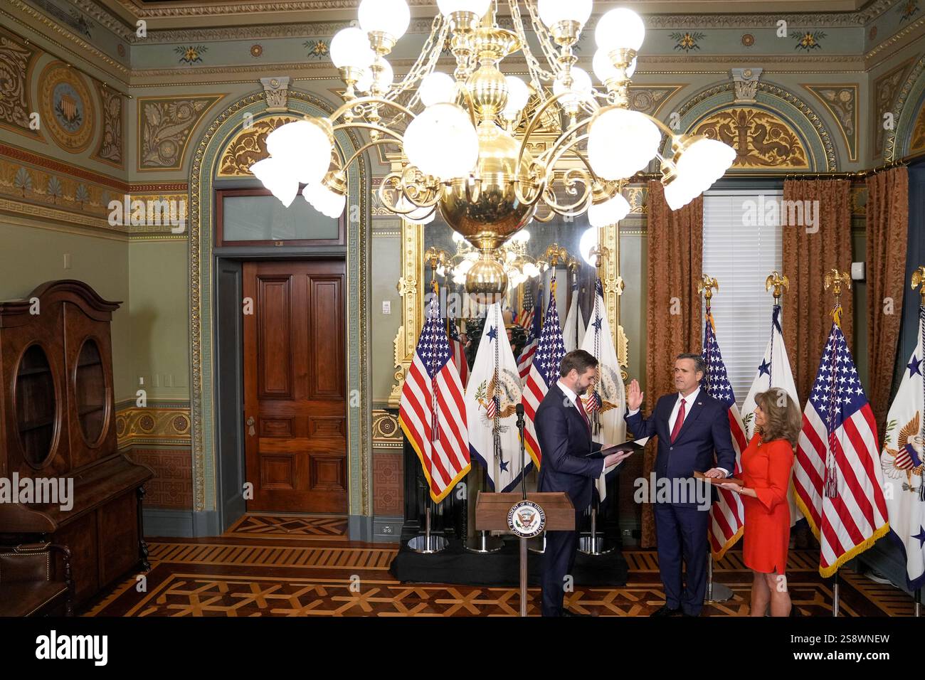 Former Director of National Intelligence John Ratcliffe (C), with his ...