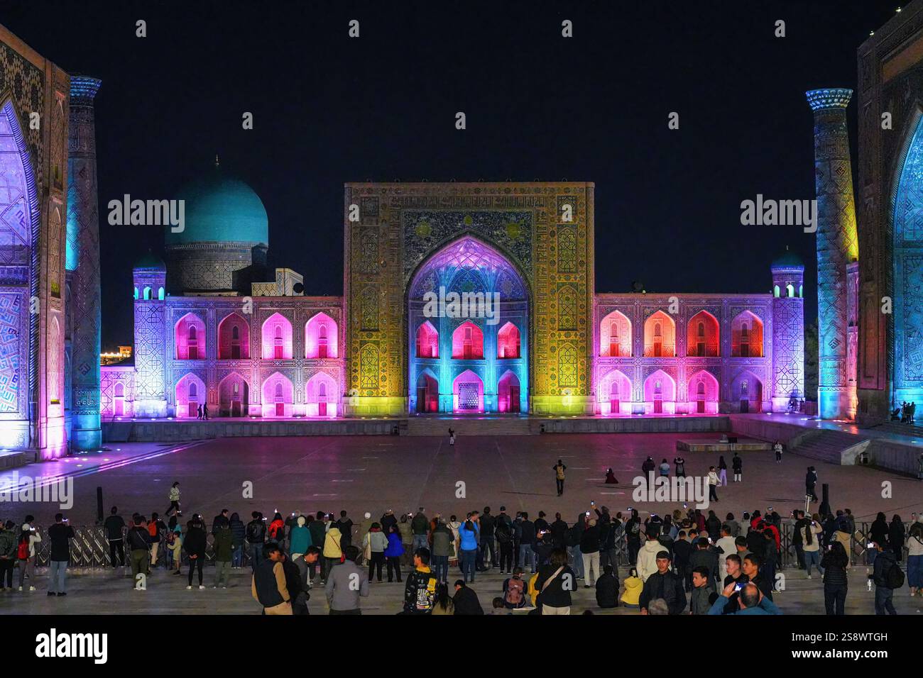 Light show on the facades of the madrassahs of the Registan Square in ...