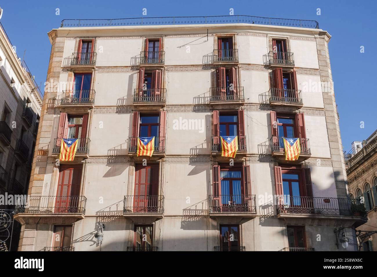 Buildings in Barcelona, Spain, with Catalonia flags hanging from the ...