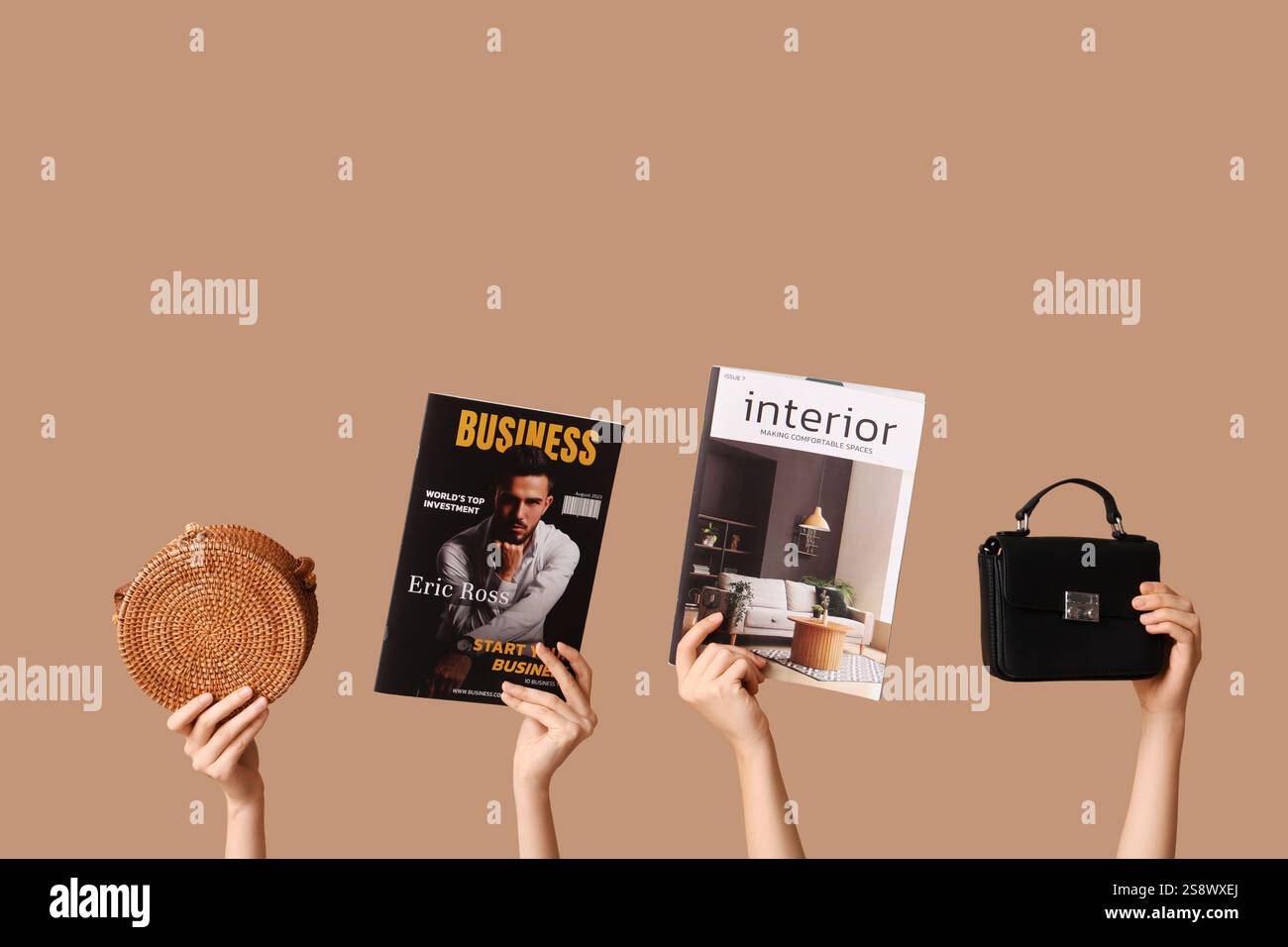 Female hands with different magazines and stylish bags on brown ...