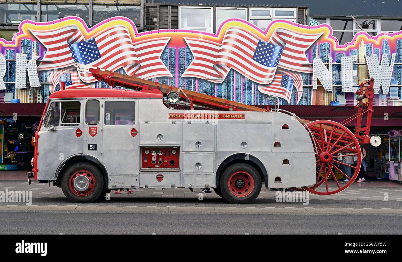 Old style fire engine outside New York amusement arcade, Eastern ...