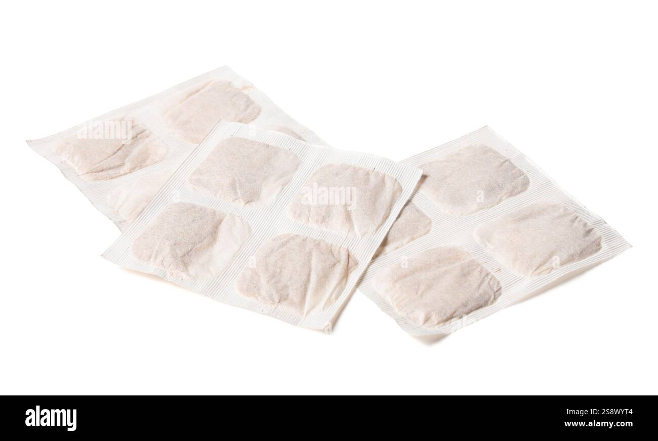 Mustard plasters on white background Stock Photo - Alamy