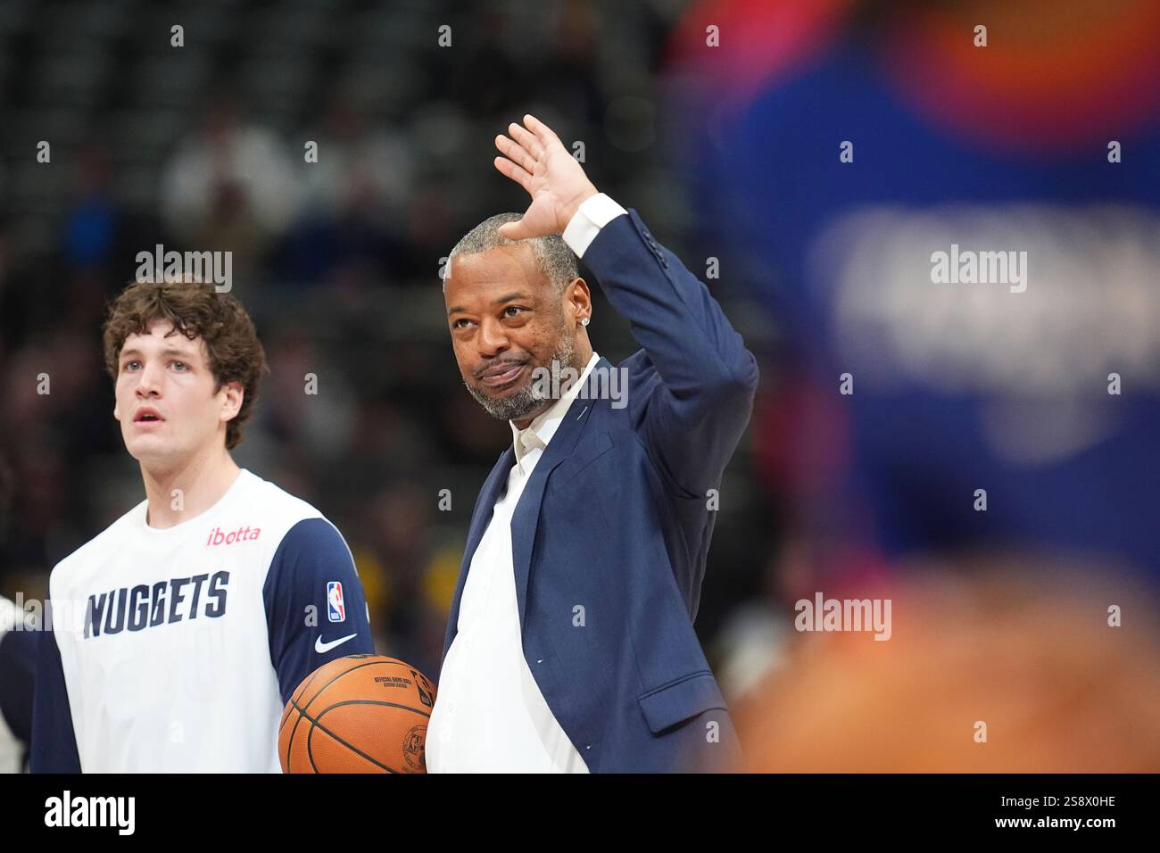 Retired NBA center Marcus Camby acknowledges the crowd before handing ...