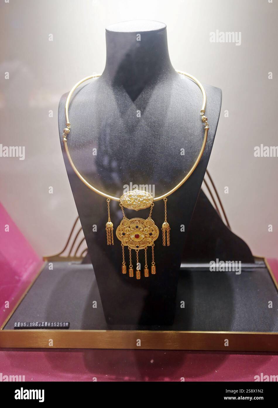 SHANGHAI, CHINA - JANUARY 23, 2025 - Customers spend money at a gold store in Shanghai, China ...