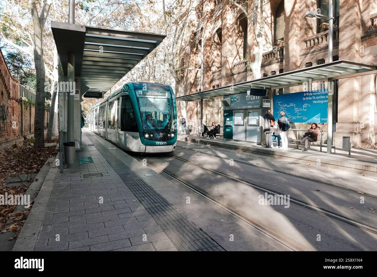 An above-ground tram and tram station on Carrer de Wellington in ...