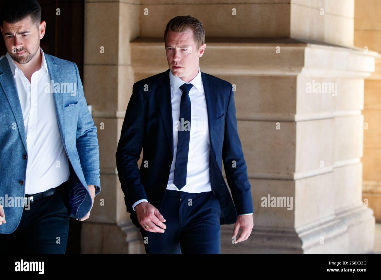 Adelaide, Australia. 24th Jan, 2025. Rohan Dennis (right) at the Sir ...