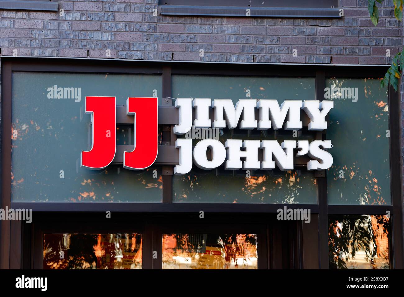 Signage for Jimmy John's franchise sandwich chain restaurant. jommy ...