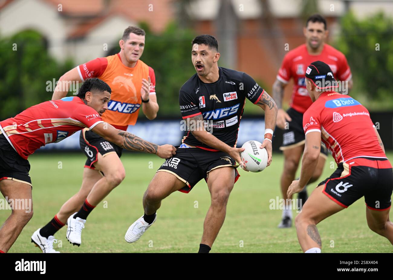 Jeremy Marshall-King (centre) in action during a Dolphins NRL training ...