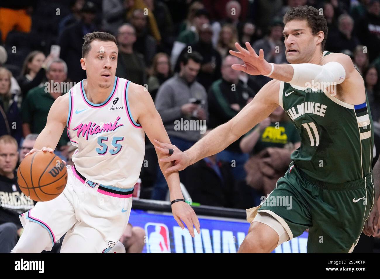 Miami Heat's Duncan Robinson gets past Milwaukee Bucks' Brook Lopez ...