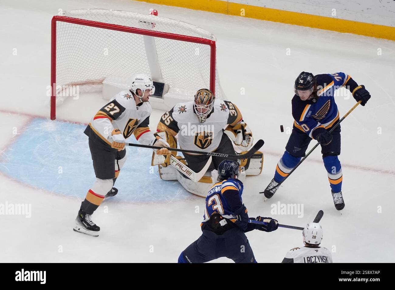 St. Louis Blues' Oskar Sundqvist (70) watches the puck as Vegas Golden ...