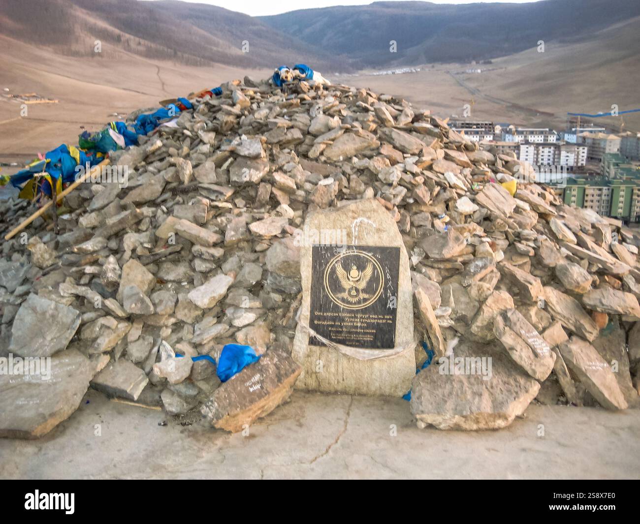 A pile of rocks with a sign on top that says "United States of America ...