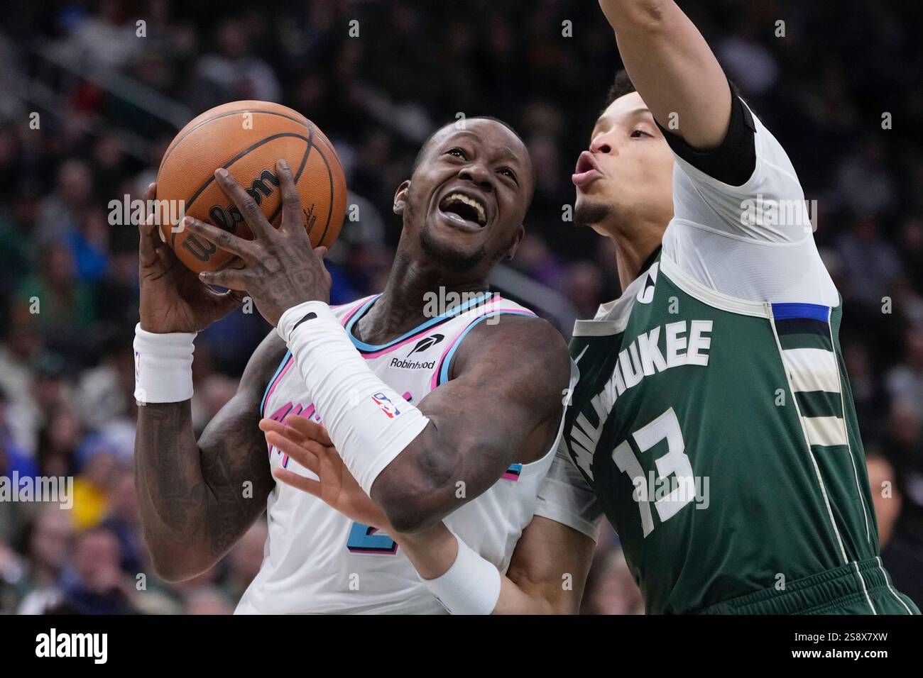 Miami Heat's Terry Rozier tries to get past Milwaukee Bucks' Ryan ...