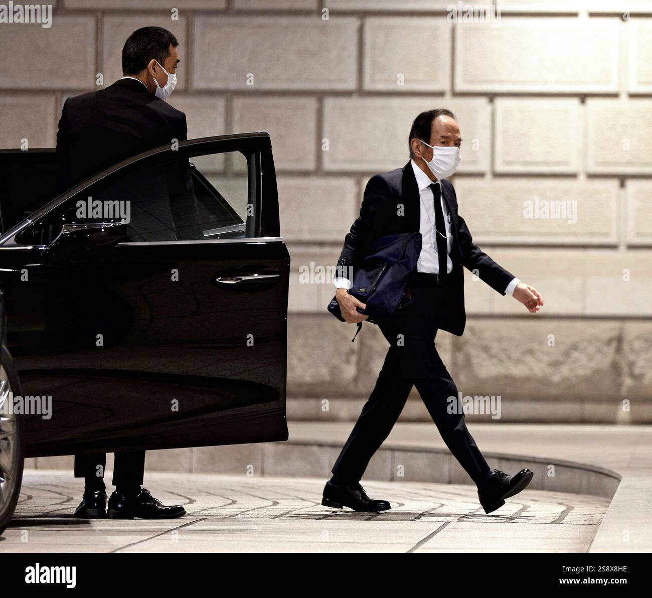 Bank of Japan Governor Kazuo Ueda enters the Bank of Japan headquarters ...