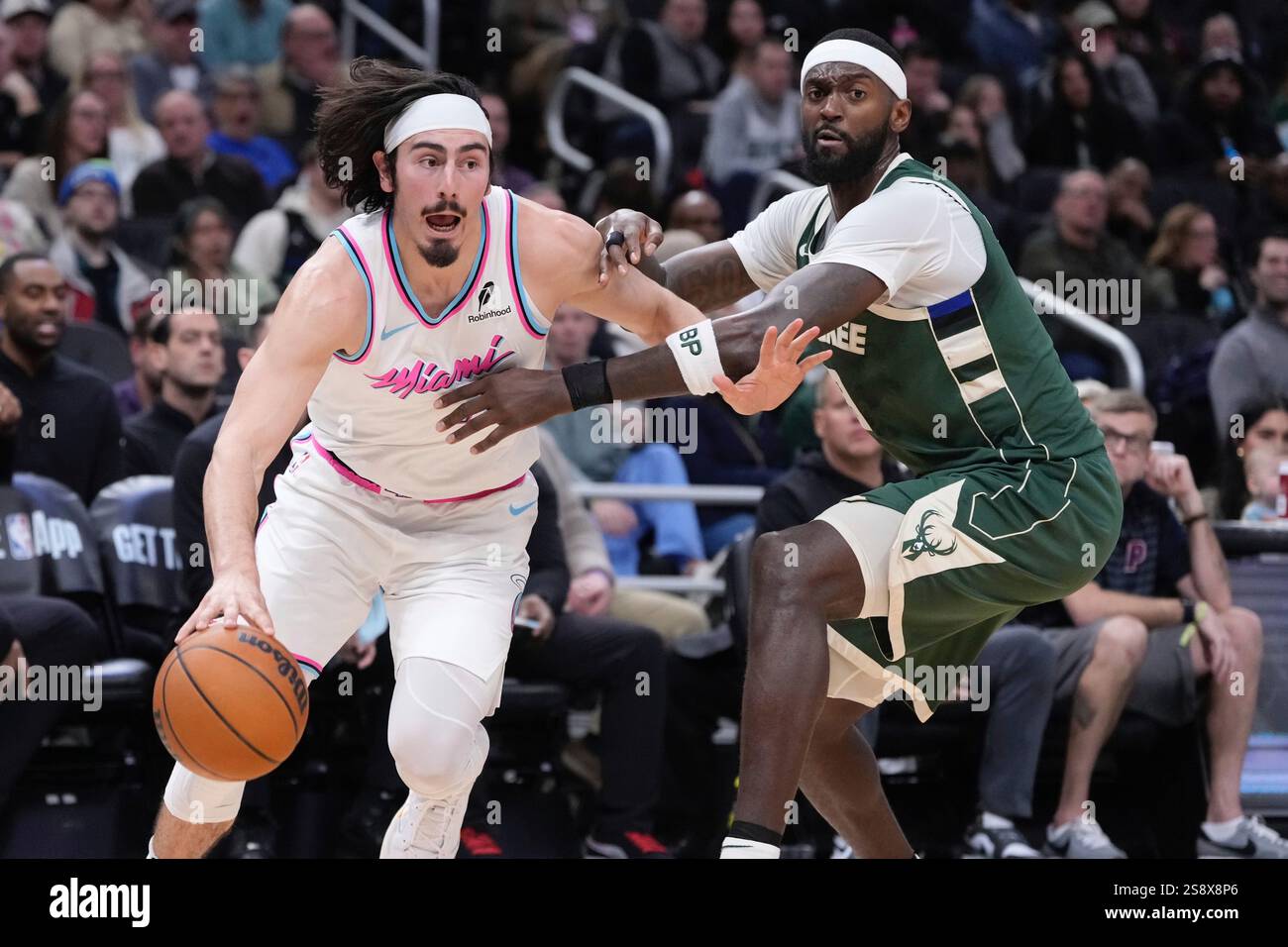 Miami Heat's Jaime Jaquez Jr. tries to get past Milwaukee Bucks' Bobby ...
