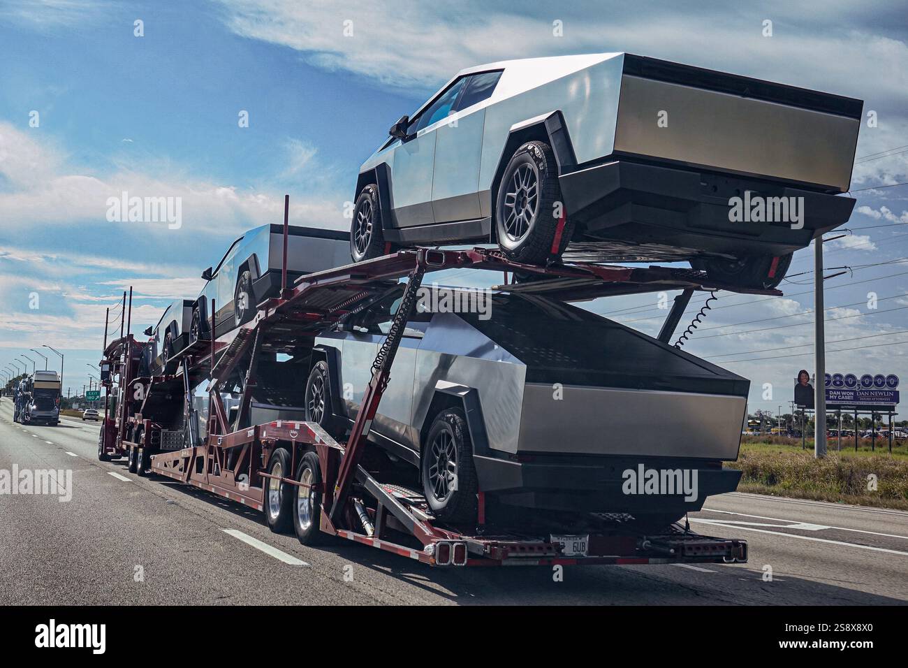 Miami, USA - January 20, 2025: Car transporter carries Tesla cybertrck ...