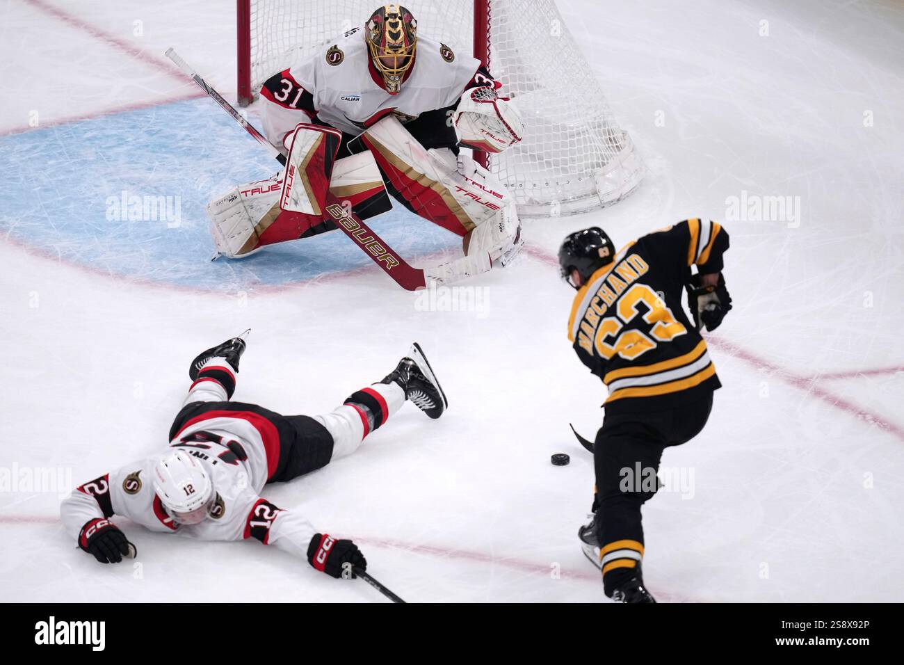 Ottawa Senators goaltender Anton Forsberg (31) watches Boston Bruins ...