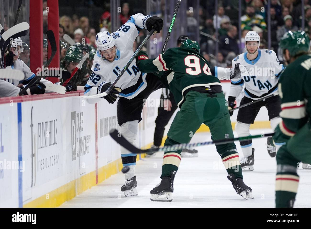 Utah Hockey Club center Kevin Stenlund (82) and Minnesota Wild center ...