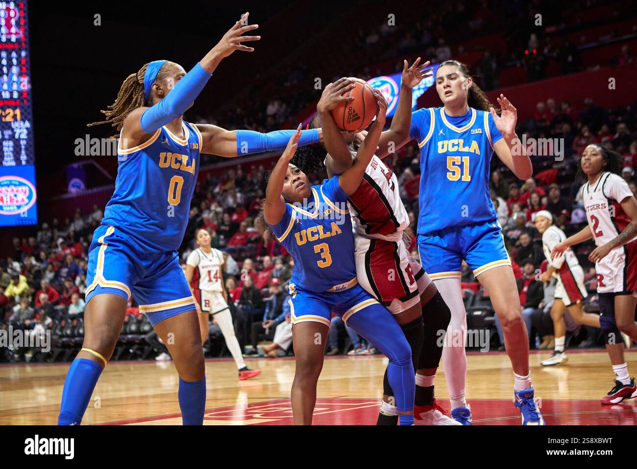 UCLA Bruins center Lauren Betts (51) gets pressure from Rutgers Scarlet ...