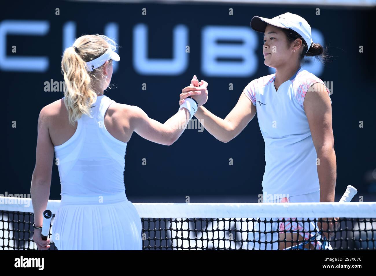 Wakana Sonobe of Japan (right) celebrates winning her Junior Girls ...