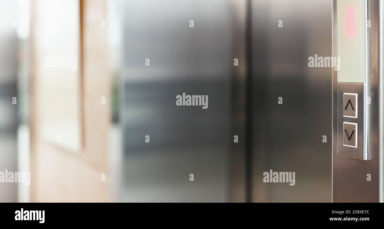 Arrow, button and elevator in office building for up or down direction ...