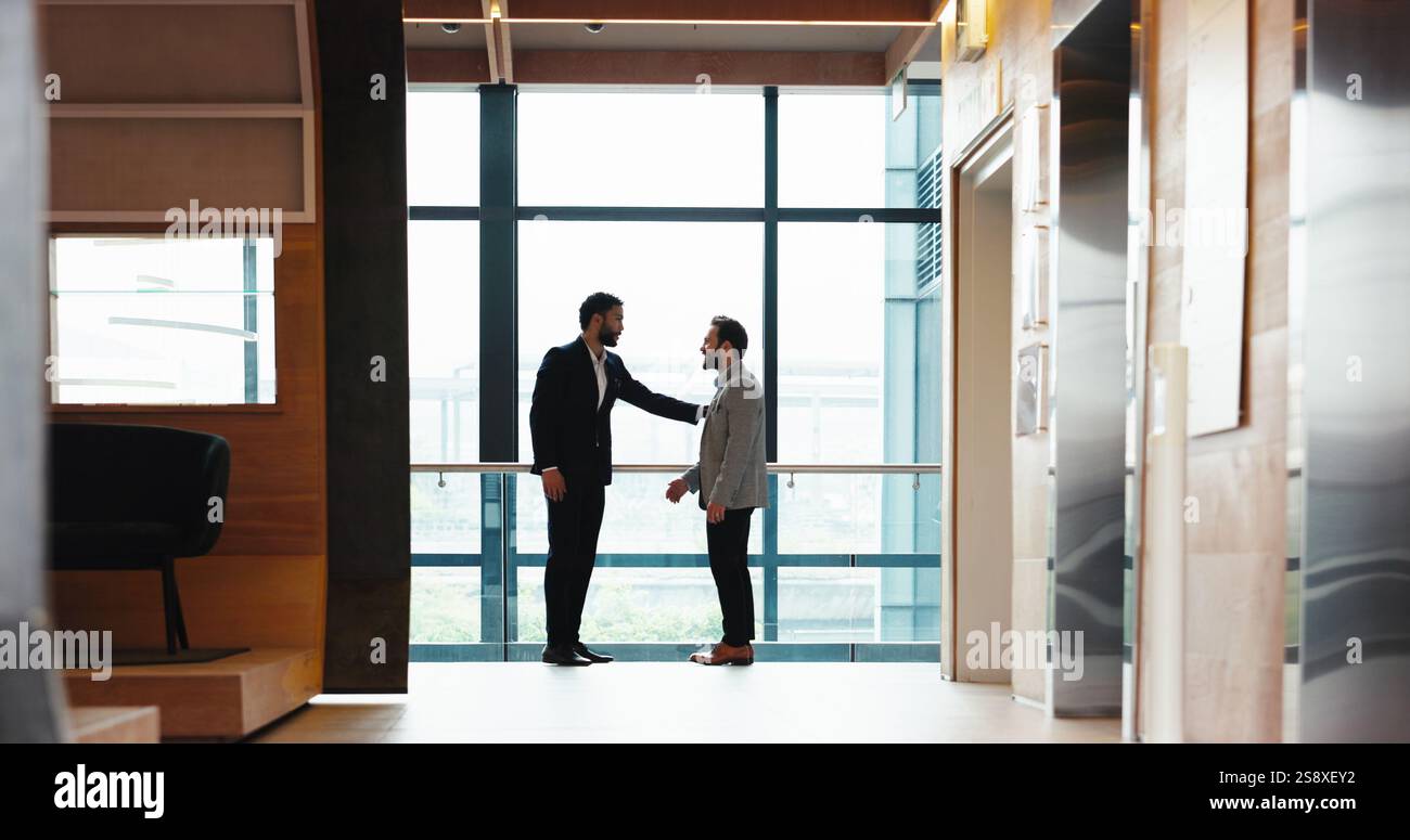 Collaboration, conversation and meeting with business people at window ...