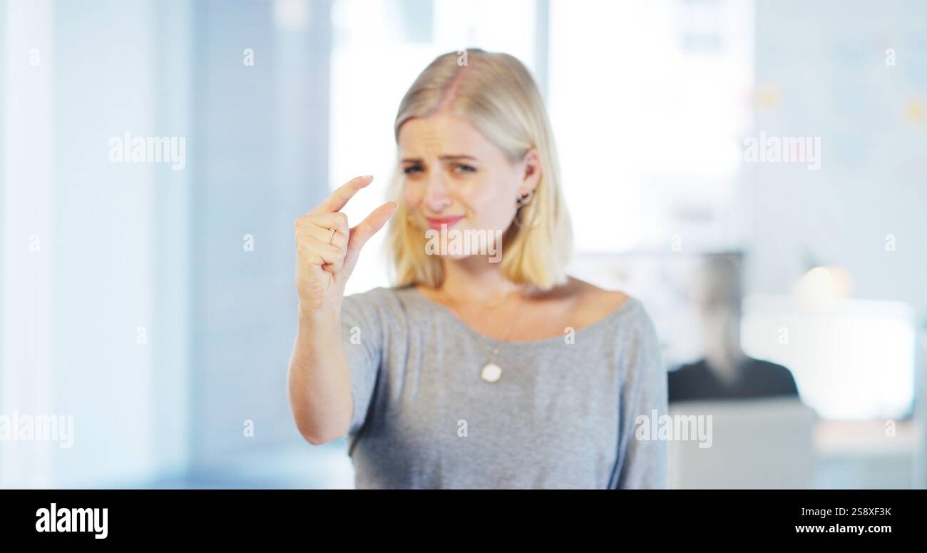 Size, doubt and portrait of businesswoman in office with small hand ...