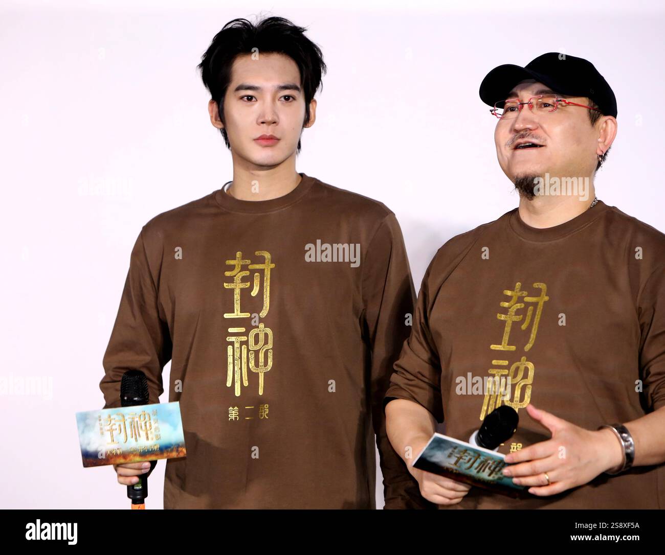 Chinese actor and model Yu Shi (left) attends an activity in Xi'an City ...