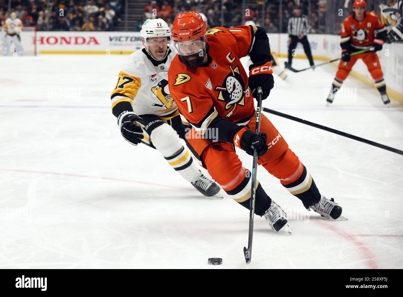 Anaheim Ducks defenseman Radko Gudas, right, controls the puck away ...