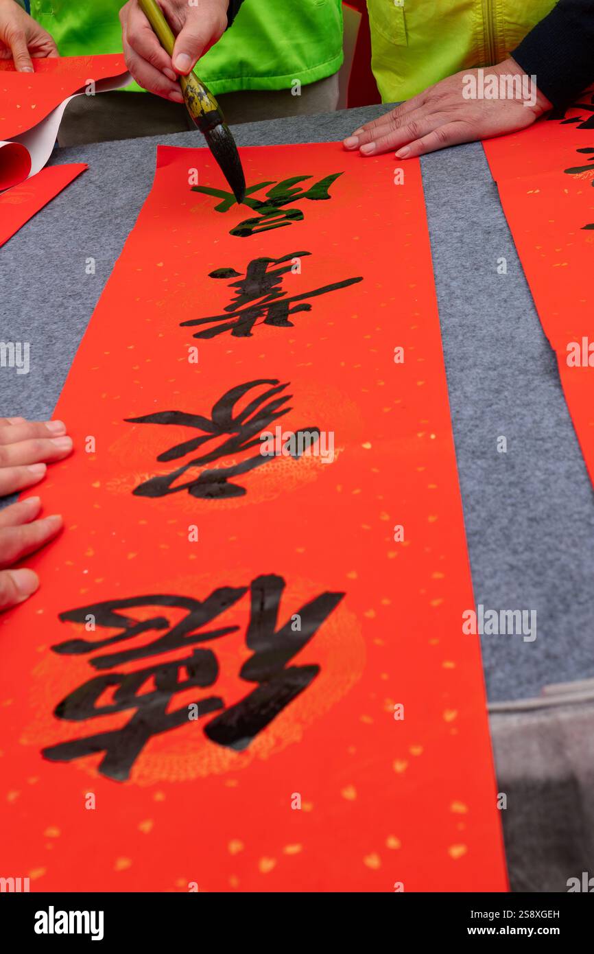 writing Chinese new year scrolls translation of the characters are ...