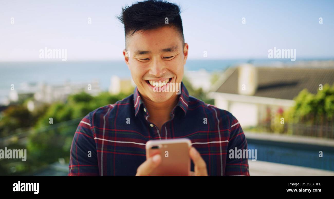 Outdoor, smile and Asian man with smartphone, typing and travel with ...