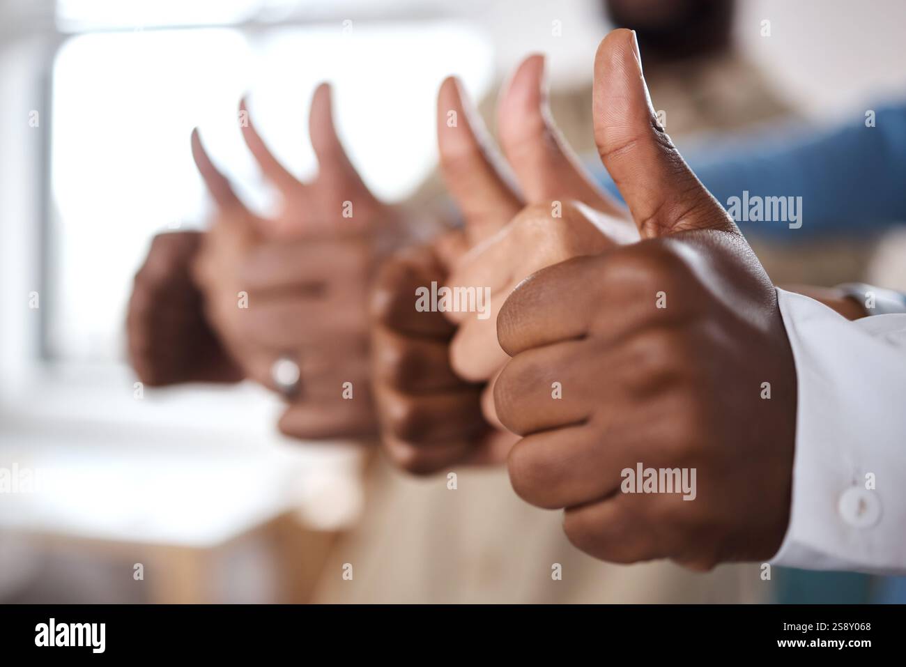 Business people, hands and group thumbs up in office, feedback vote and support in unity ...