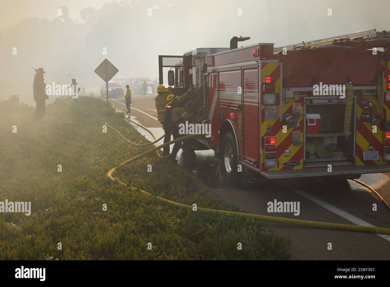 Firefighters battle with the fire at the fire scene. The Gilman Fire ...