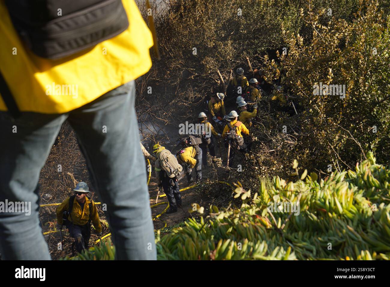 Firefighters battle with the fire at the fire scene. The Gilman Fire ...