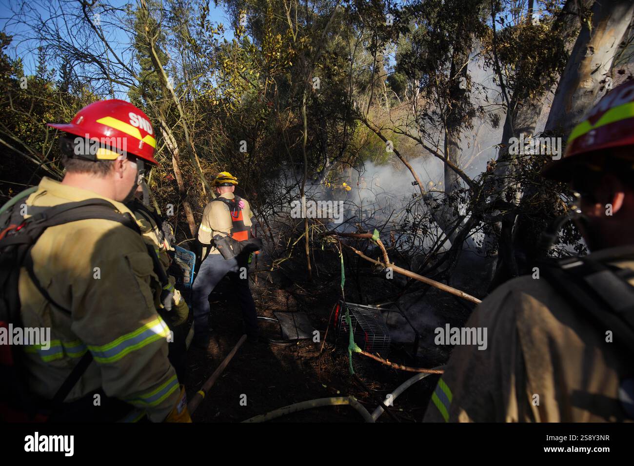 Firefighters battle with the fire at the fire scene. The Gilman Fire ...