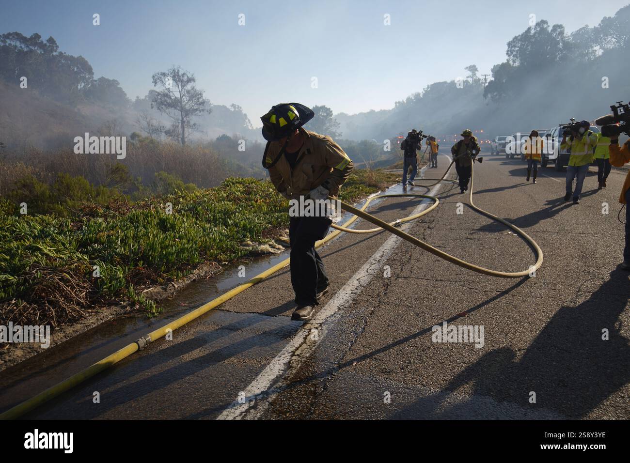 Firefighters battle with the fire at the fire scene. The Gilman Fire ...