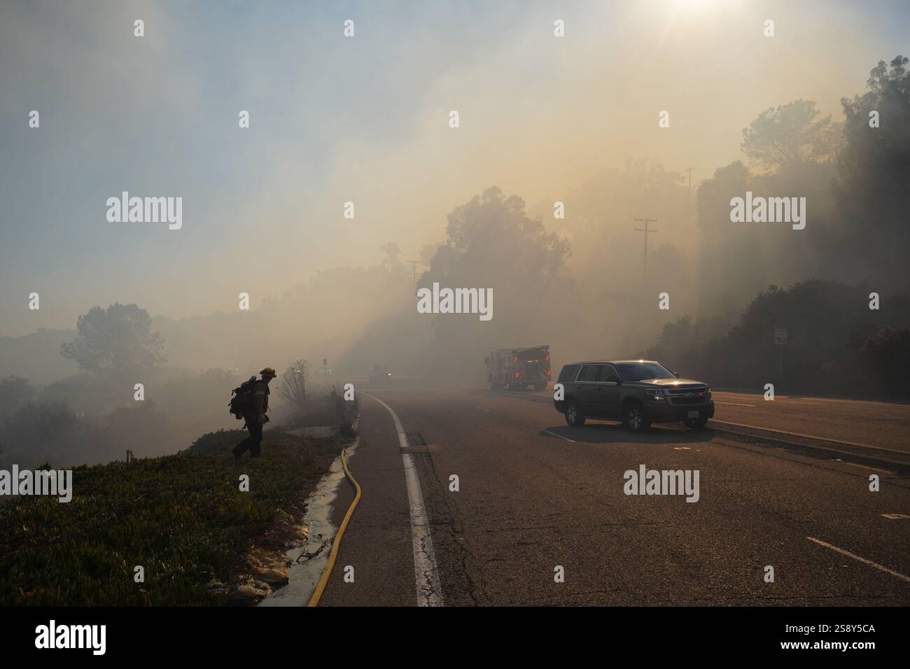 Firefighters battle with the fire at the fire scene. The Gilman Fire ...