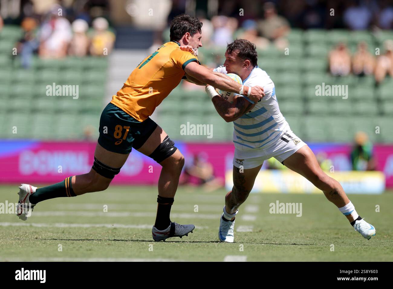 Michael Icely of Australia tackles Luciano Gonzalez of Argentina during ...