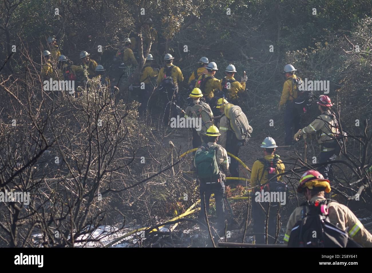 Firefighters battle with the fire at the fire scene. The Gilman Fire ...