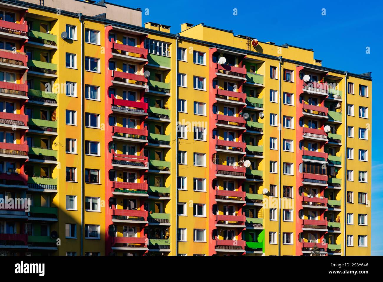 Exploring the contrast between colorful urban apartments and the impact ...