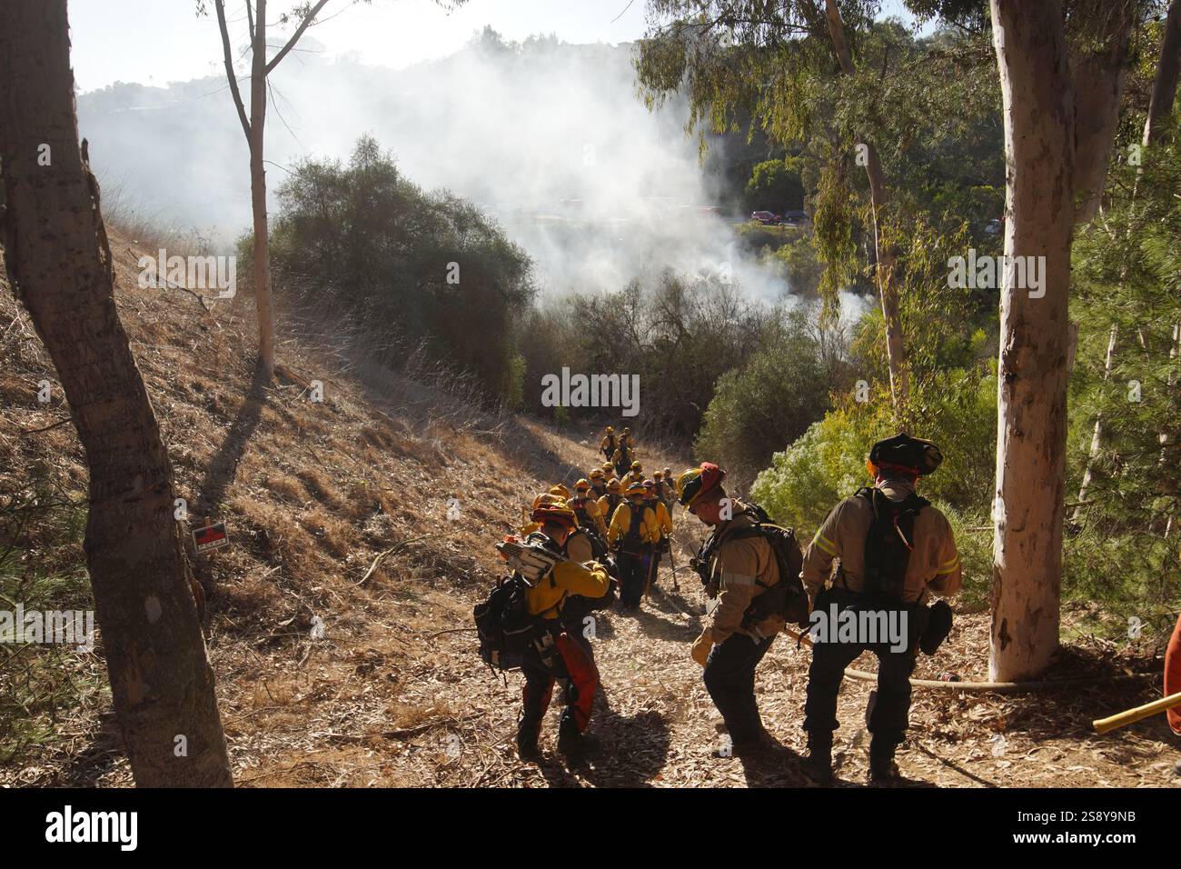 Firefighters battle with the fire at the fire scene. The Gilman Fire ...