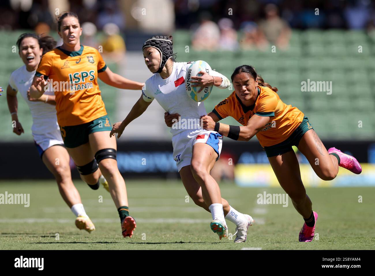 Faith Nathan of Australia tackles Liu Xiaoqian of China during the ...