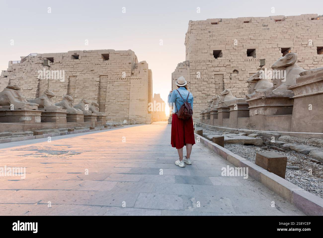 Tourist walking along stone temple hi-res stock photography and images ...